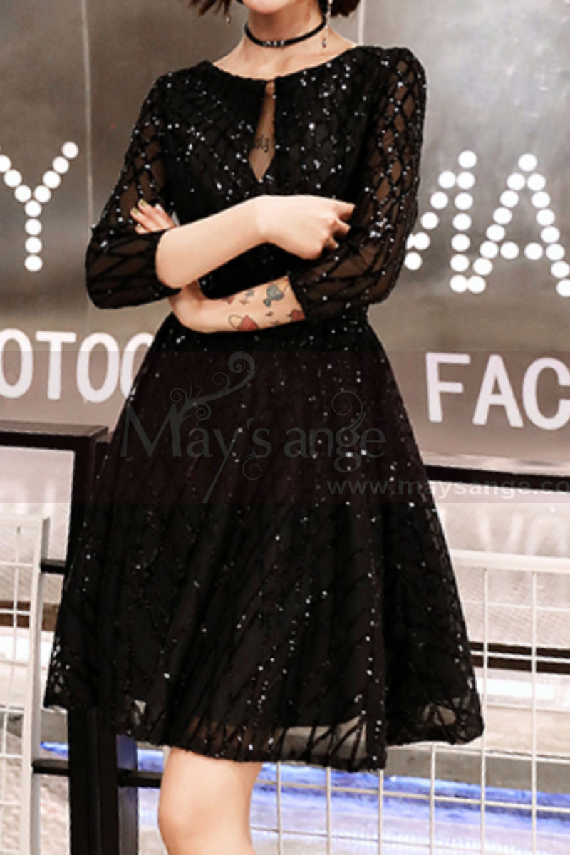 Simple black cocktail dress with rhinestones and simple mid-long sleeves