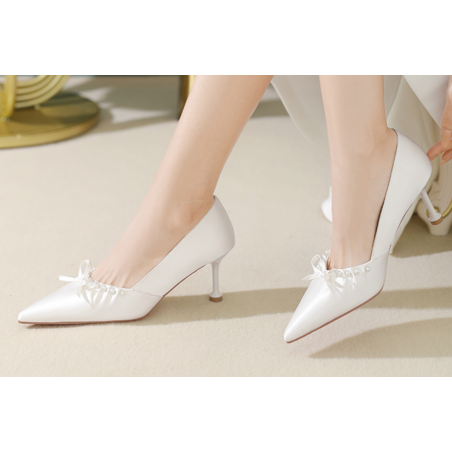 Simple and classy white pumps for wedding